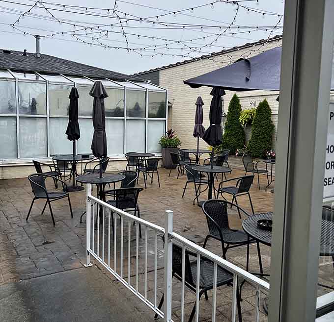 String lights transform the patio into an enchanting outdoor dining space perfect for warm Ohio evenings and good company.