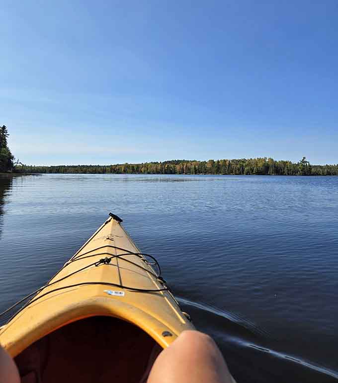 Kayaking across Bear Head Lake offers the kind of peace and quiet that makes you forget your phone exists, which is basically a modern miracle.