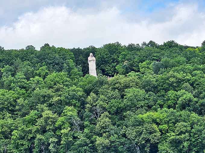 Playing peekaboo through the trees, the statue seems to be hiding in plain sight – Illinois' best-kept monumental secret.
