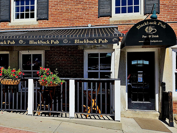 Blackback Pub's inviting exterior promises comfort food and exceptional brews &ndash; the perfect combination after exploring Waterbury's charms.