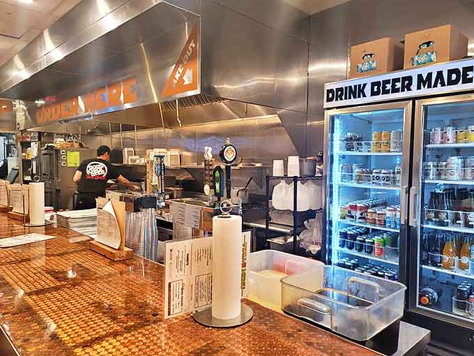 Behind the counter where magic happens – stainless steel gleaming with purpose and promise.