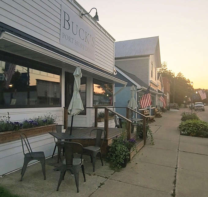 As evening approaches, Buck's outdoor seating offers a perfect spot to enjoy the quiet charm of Port Hope's main street.