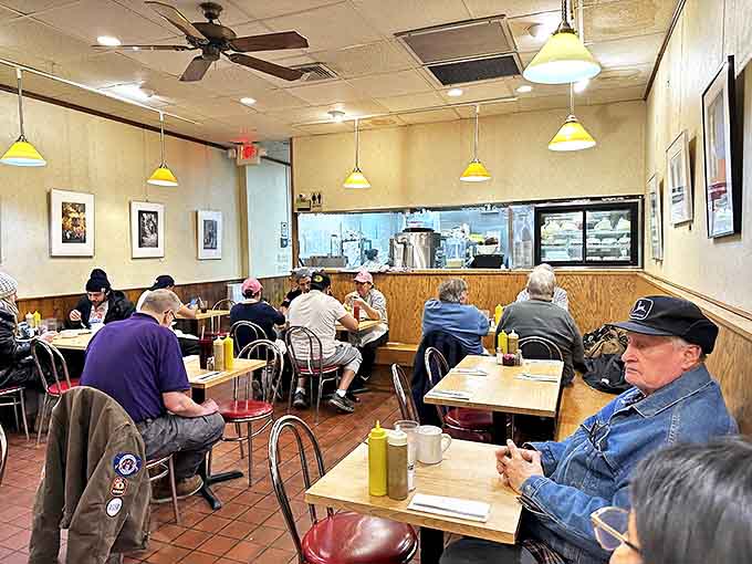 Regulars and first-timers sharing the same space, united by the universal language of "mmm" and occasional napkin emergencies.