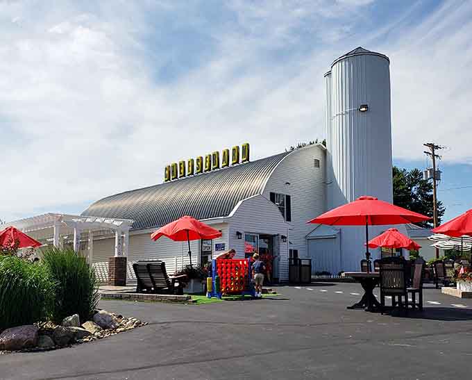 The entrance celebrates decades of cheese excellence &ndash; a pilgrimage site for dairy devotees and curious travelers alike.