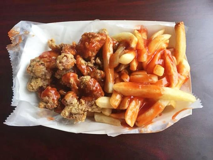 Chicken gizzards transformed from humble organ meat to crispy, sauce-drenched delicacies that disappear faster than you'd expect.