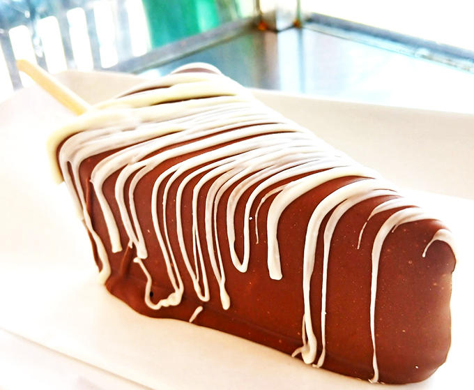 Frozen cheesecake meets chocolate in a combination that makes you question every dessert decision you've made until this moment.