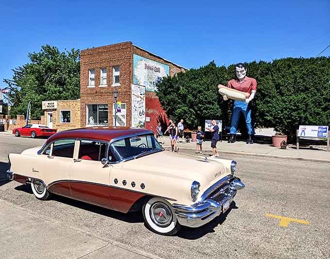This vintage beauty seems right at home beside the giant – two preserved specimens from America's golden age of the automobile.