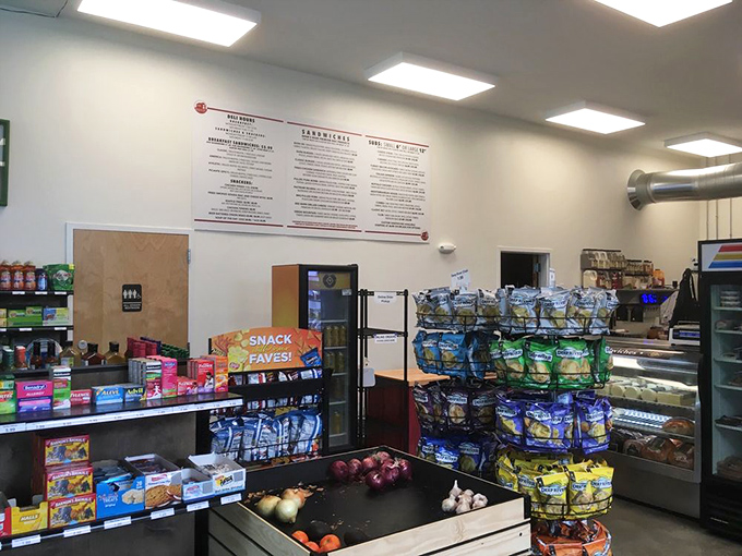 The counter area balances efficiency with small-town charm &ndash; where sandwich magic happens while locals catch up on community news.