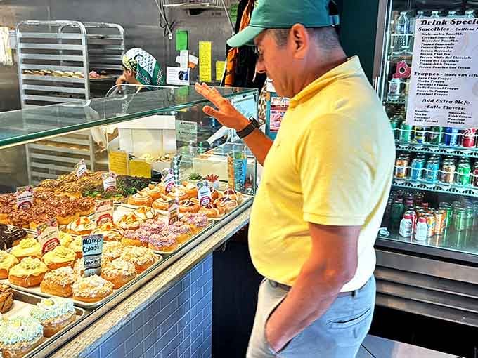 The look of concentration while selecting donuts &ndash; it's the face of someone making what might be the day's most important decision.