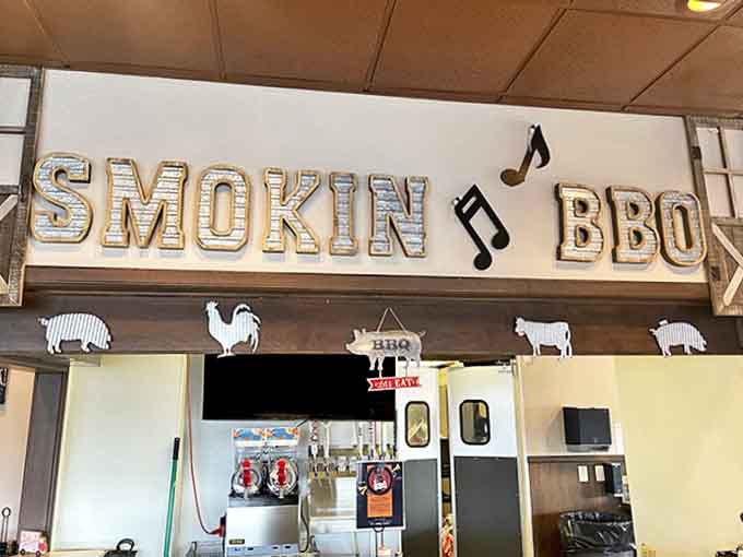 Rustic "SMOKIN' BBQ" signage with musical notes cleverly integrates the restaurant's theme without being heavy-handed about it.