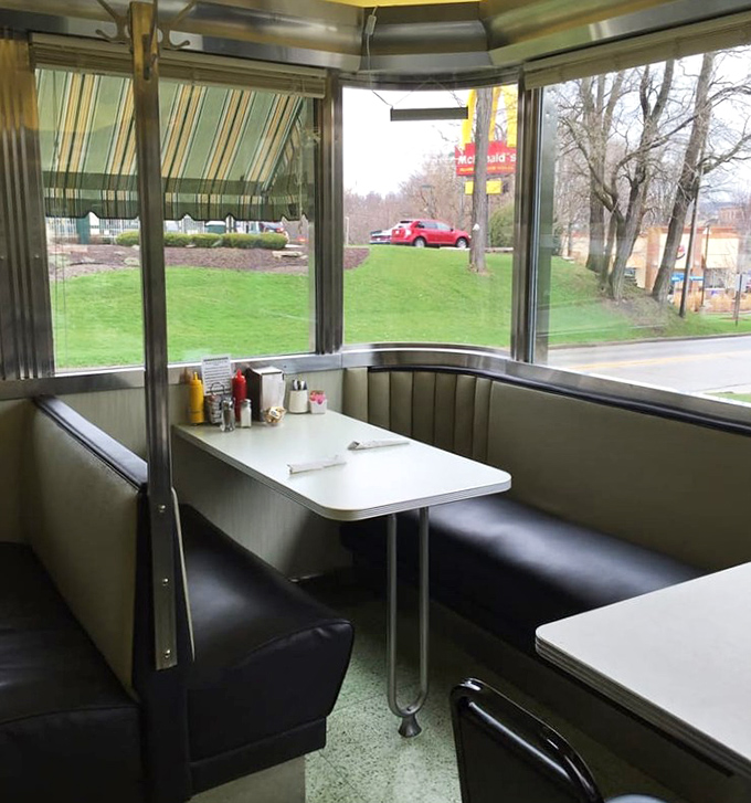 The corner booth – prime real estate for people-watching while debating whether you have room for pie (you always do).