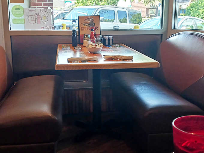 A cozy booth by the window offers the perfect vantage point for both people-watching and plate-admiring &ndash; the best of both worlds in diner real estate.