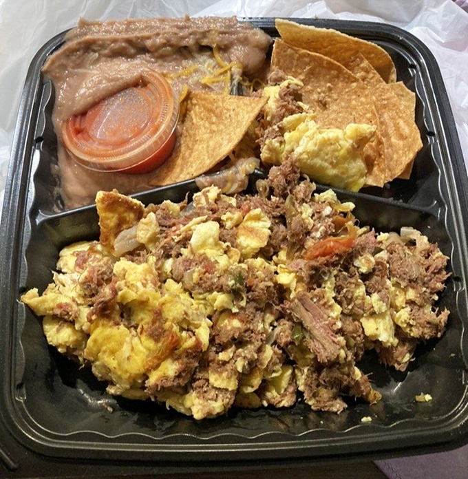 Breakfast reimagined: eggs and machaca beef mingling like old friends at a reunion, creating morning magic that puts ordinary breakfast to shame.