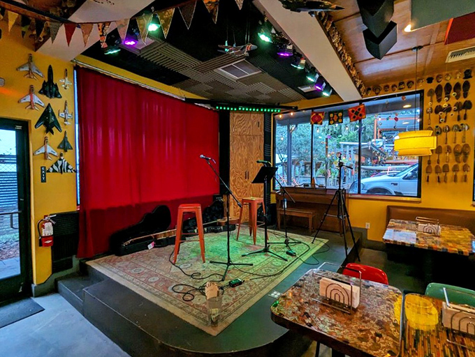The stage stands ready for local musicians to provide the soundtrack to your meal &ndash; even the microphone looks happy to be here.