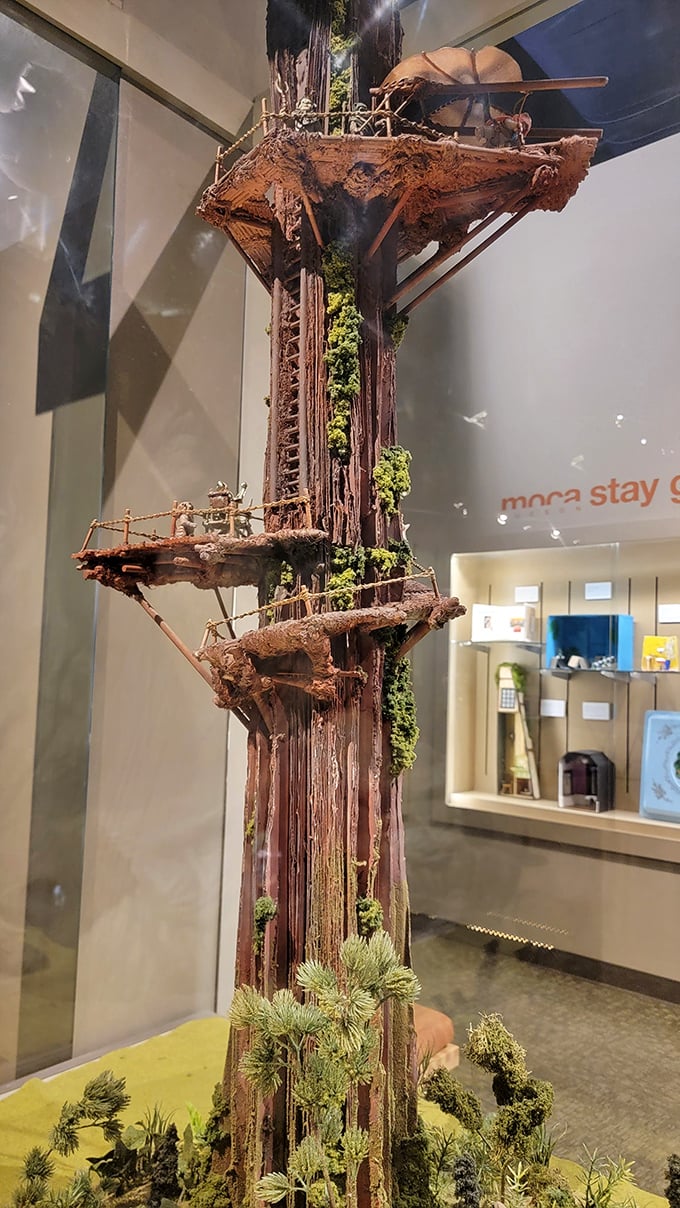 An Ewok-inspired treehouse village climbs skyward with impossibly detailed platforms and tiny rope bridges that would make George Lucas do a double-take.