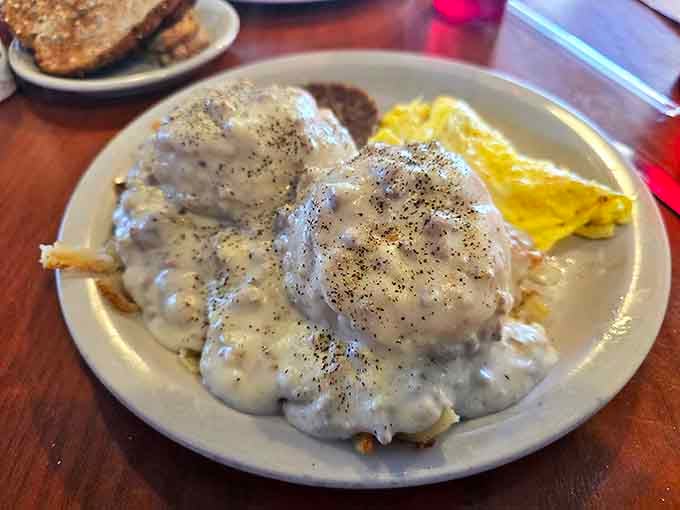 Southern comfort that migrated north and found happiness. That pepper-speckled gravy is basically a warm hug on a plate.