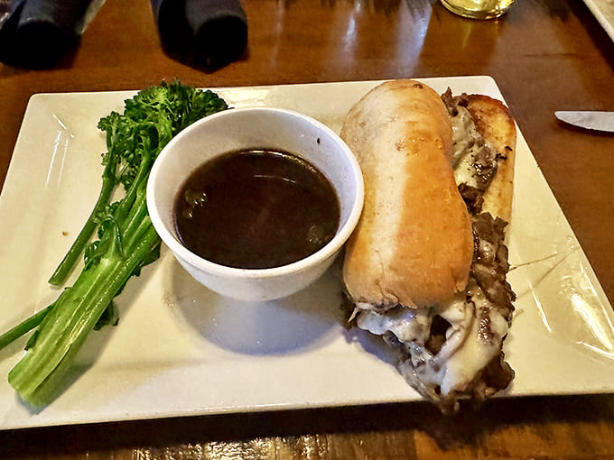 The sandwich that demands respect – tender beef, melty cheese, and that magical jus for dipping that makes you want to drink it when nobody's looking.