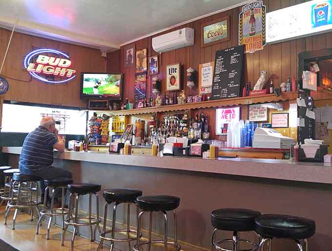 Bar seating where locals gather to catch up over lunch, creating the community atmosphere that defines this place.