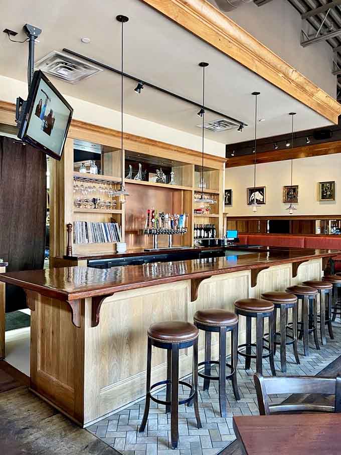 Bar seating offers front-row views of the drink-making action and easy conversation with skilled bartenders who know their craft.