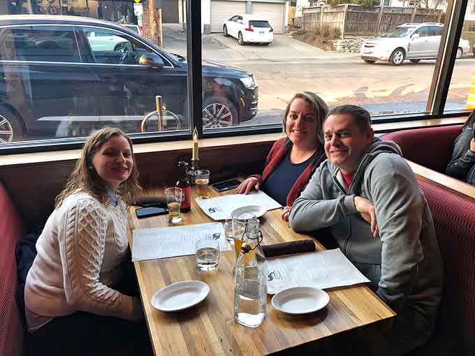 Those smiles say it all: this is what happens when good food meets good company in a space that feels like home.