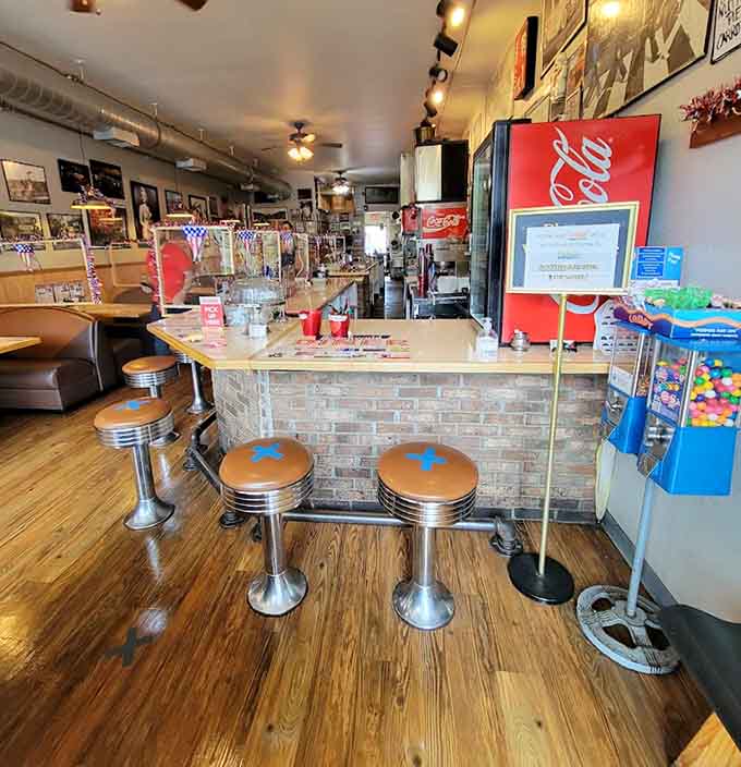 The dining room stretches invitingly with comfortable seating and that authentic diner atmosphere that never goes out of style anywhere.