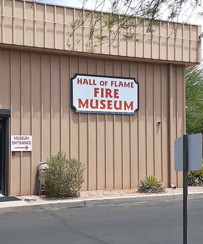 The Veteran Fireman's Association banner from 1896 represents the proud traditions and tight-knit communities that have always defined firefighting culture.