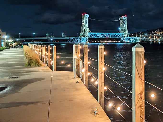 Houghton Waterfront Pier: The iconic lift bridge glows with evening magic, creating a scene straight from a Great Lakes fairy tale.