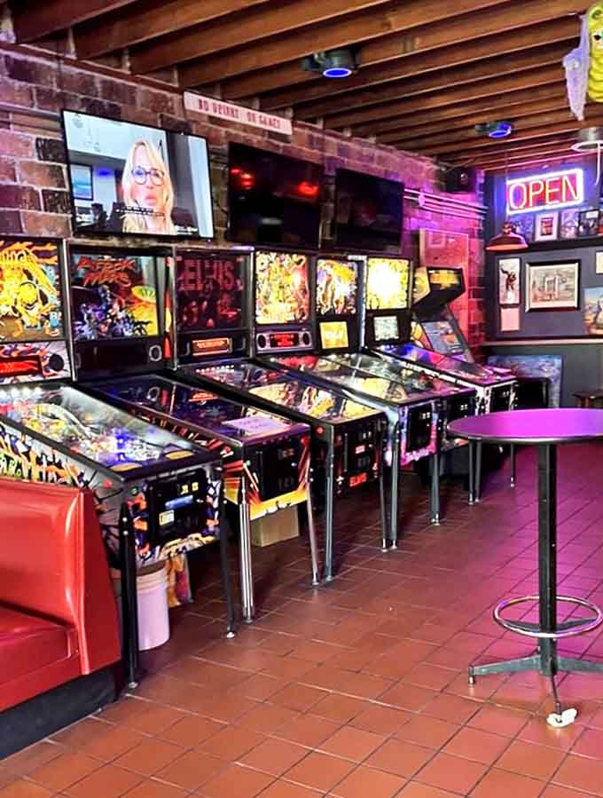 Pinball machines stretch into the distance, each one a portal to simpler times when high scores mattered more than anything.