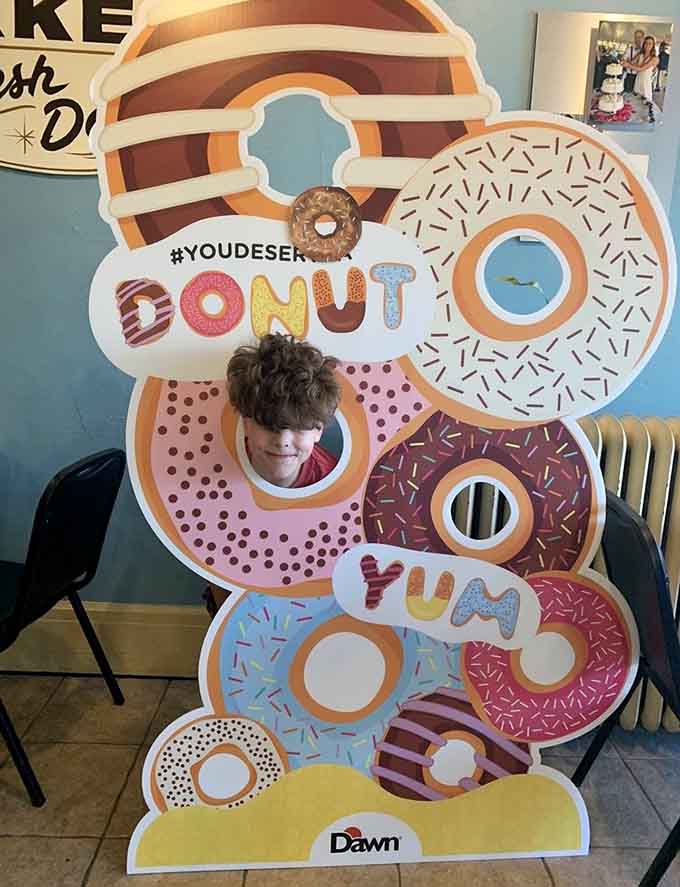 Strike a pose in the donut frame, because if you didn't photograph your bakery visit, did it even happen?