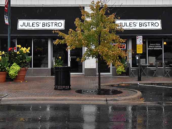 The charming striped awning and outdoor seating invite passersby to discover what locals already know about this gem.