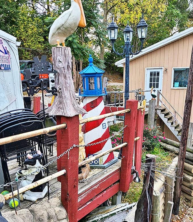 Nautical whimsy at every turn &ndash; this lighthouse decoration perfectly captures the playful maritime theme throughout the property.