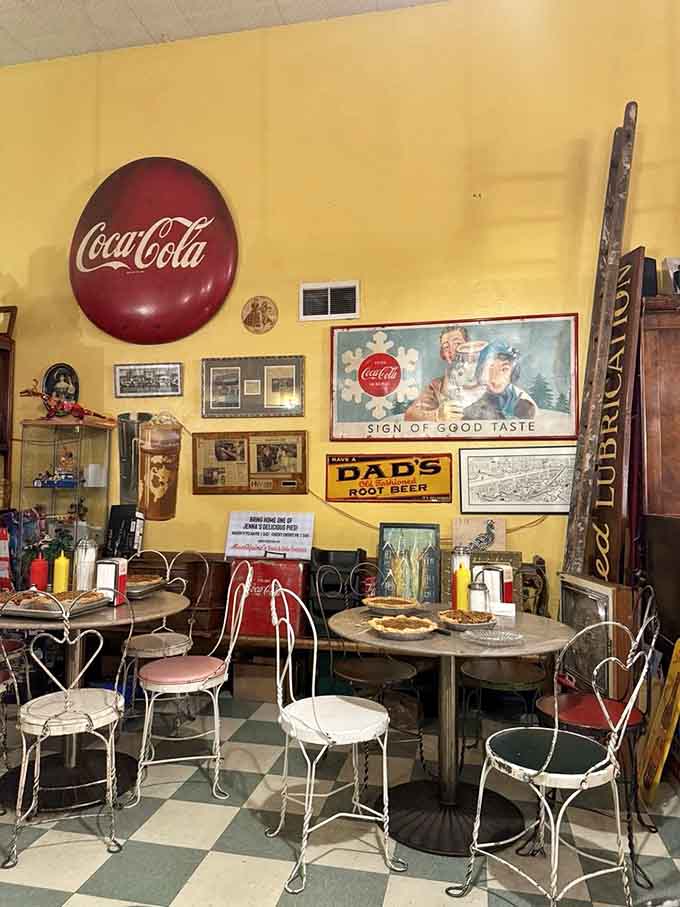 Colorful vintage chairs and retro signage create dining spaces where every seat offers a view into the past.