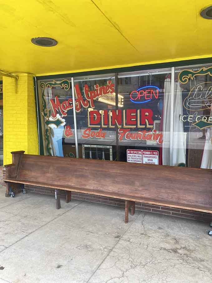 The storefront's retro signage practically shouts "Come in!" in a font that hasn't been cool since Eisenhower was president, which somehow makes it cool again.