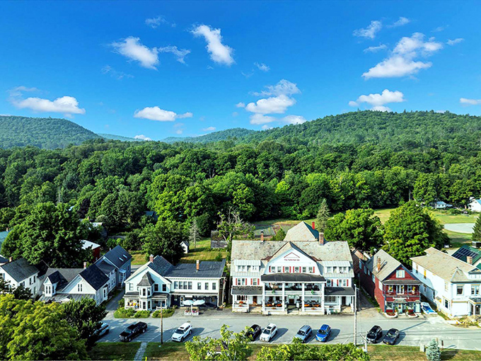 Summer reveals Chester's verdant mountain backdrop, with the town's historic buildings nestled like gems in a lush green setting.