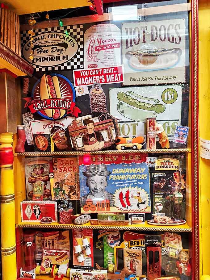 This isn't just decoration &ndash; it's a loving shrine to hot dog history, with vintage advertisements and collectibles that span decades of American food culture.