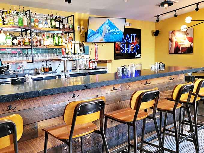 Counter seating isn't just efficient &ndash; it's theater with a view of culinary magic. These stools have supported decades of satisfied diners watching breakfast ballet.