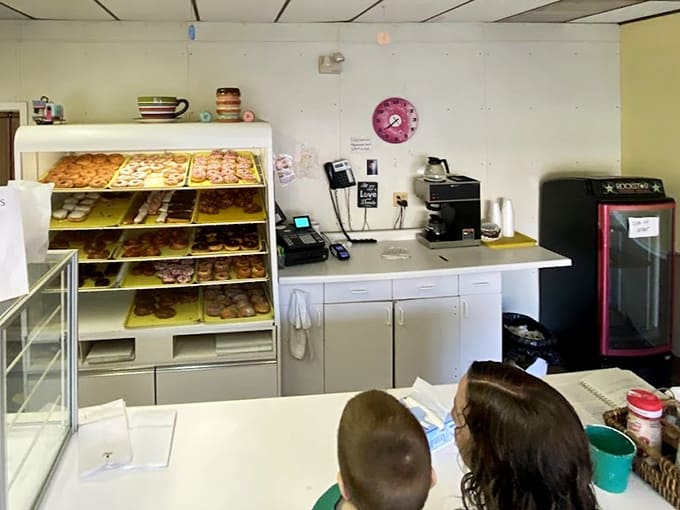 The counter where magic happens, where dozens get boxed up and dreams come true one pastry at a time.