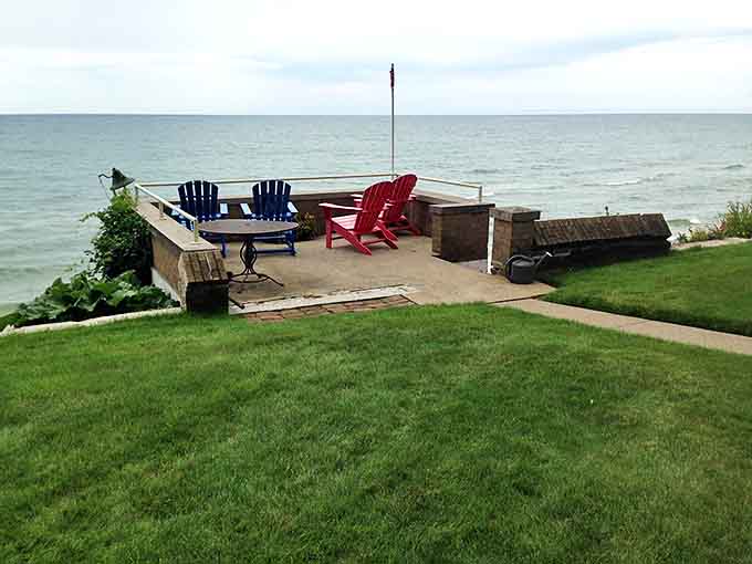This waterfront hangout spot with colorful chairs practically begs you to sit down, relax, and forget your responsibilities exist.