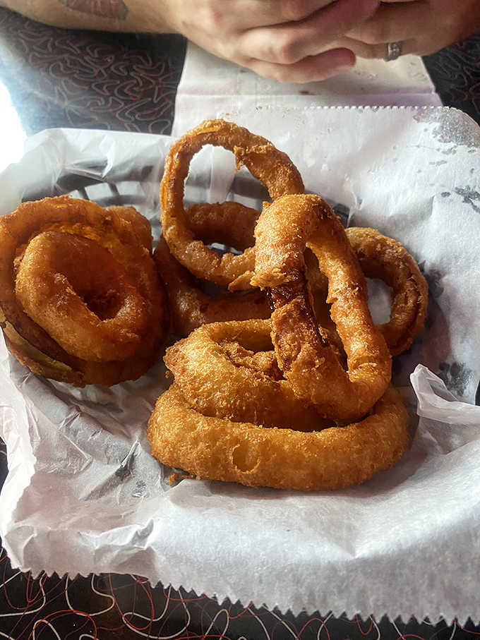 Golden hoops of happiness with the ideal batter-to-onion ratio, these supporting actors steal every scene they appear in.