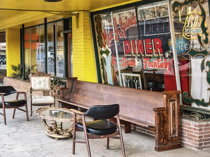 Vintage furniture creates an impromptu waiting area where anticipation builds for the sweet treasures waiting inside.