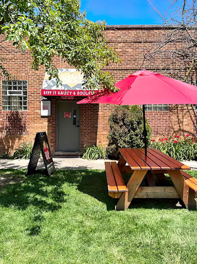 Sunshine and smoked meat &ndash; nature's perfect pairing! These picnic tables under blue skies offer the ideal setting for sauce-stained happiness.