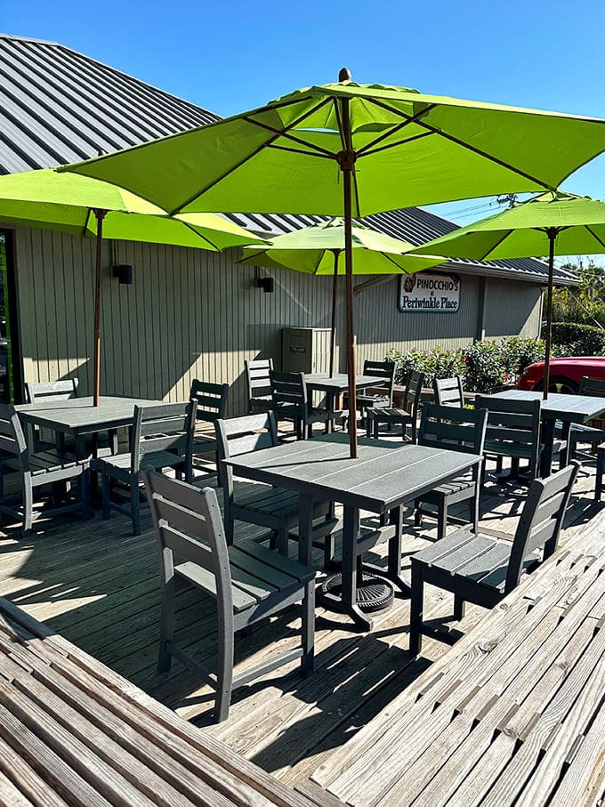Gray wooden tables and chairs create a casual, beachy vibe where countless ice cream headaches have been worth every delicious moment.