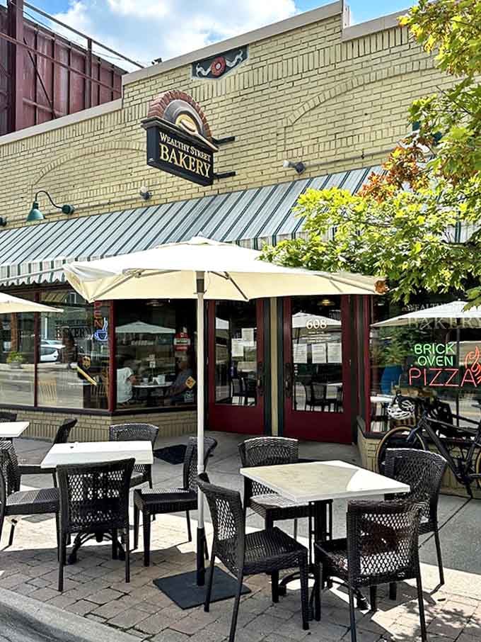 Sidewalk seating that transforms ordinary mornings into mini-vacations &ndash; where people-watching and pastry-eating combine for peak urban enjoyment.