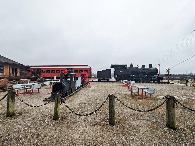 Vintage train equipment creates a museum-like atmosphere outside, adding to the authentic railroad experience before you even eat.