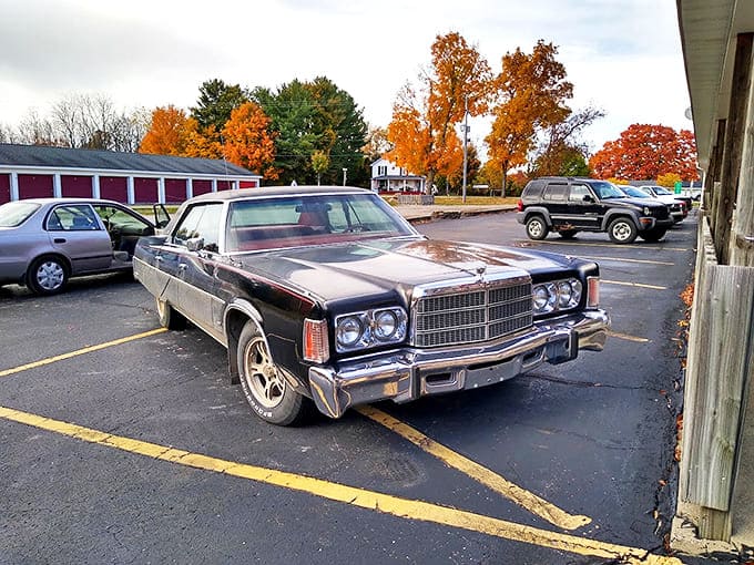 Parking Area: Even the classic cars in the parking lot seem right at home, like they've returned to visit old friends inside the barn.