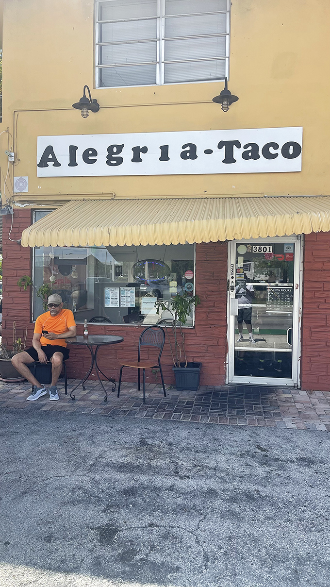 A sliver of outdoor seating where lucky diners can savor their treasures under Florida sunshine with a side of people-watching.