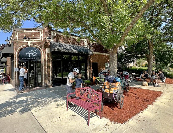 Outdoor seating with cheerful red furniture provides the perfect spot to enjoy your treats while pretending you're somewhere much fancier than Minnesota.
