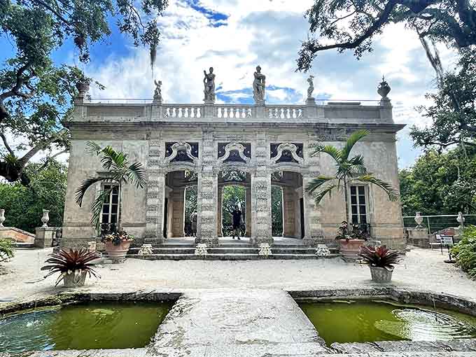 Classical columns frame Miami's tropical landscape, creating picture-perfect vignettes that blend Old World formality with New World sunshine.