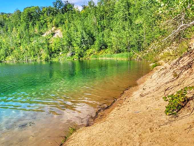 Sandy shores meet impossibly clear waters, creating a beach experience that makes you forget you're hundreds of miles from any ocean.