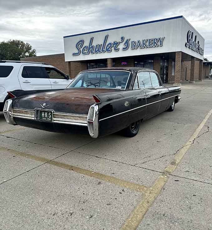 The parking lot at Schuler's has seen everything from vintage Cadillacs to modern SUVs, all united in their quest for carbs.